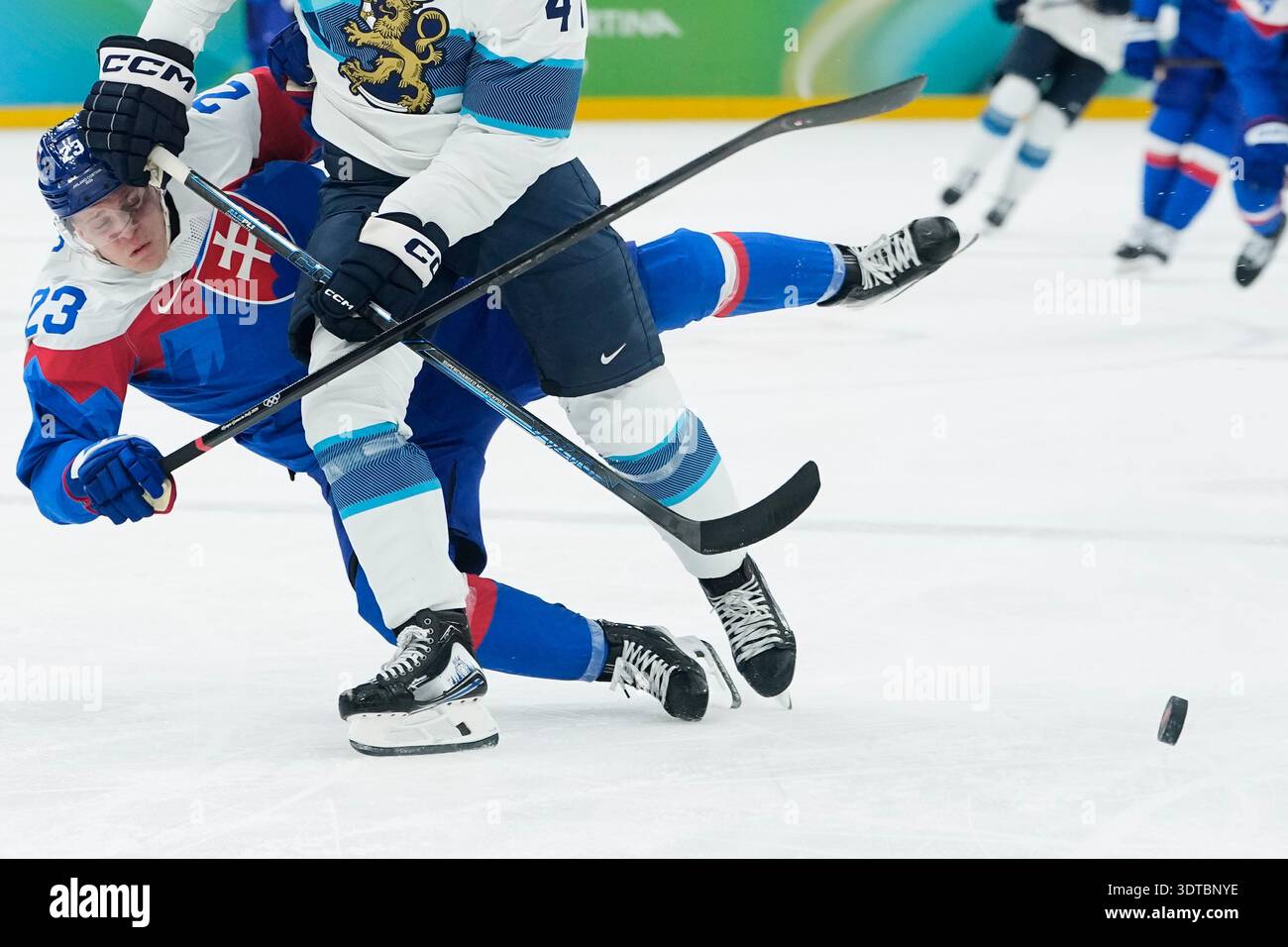 Slovakia's Adam Liska (23) collides with Finland's Miro Heiskanen (41 ...