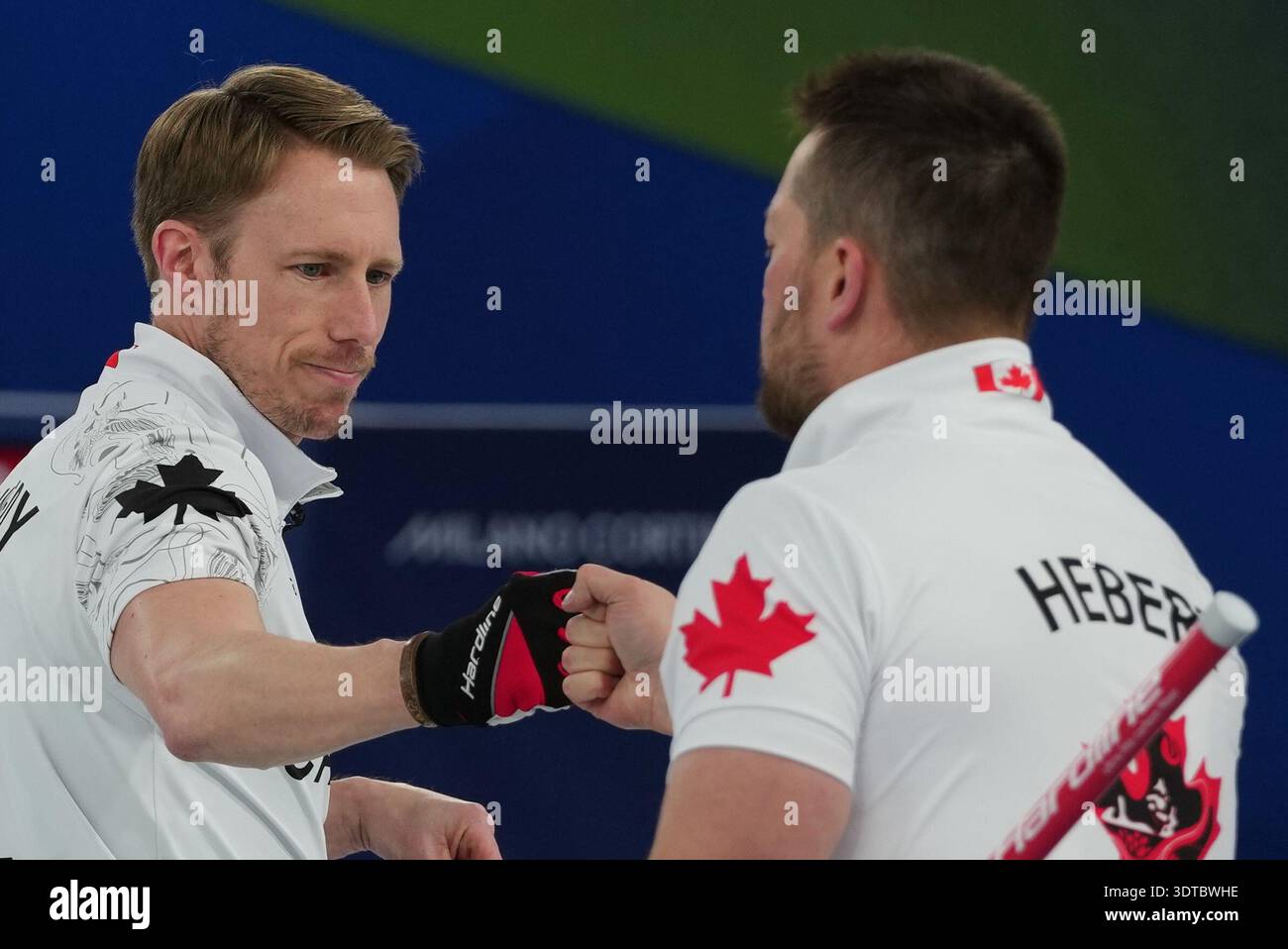 Canada's Marc Kennedy, left, and Ben Hebert react during a men's ...