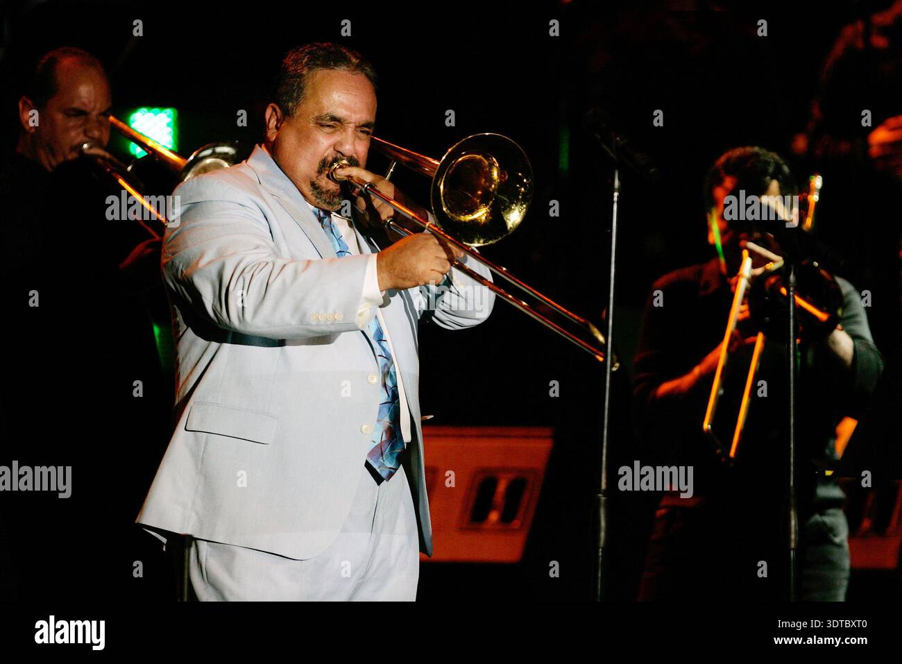 FILE - Willie Colon plays the trombone while performing the song "La ...
