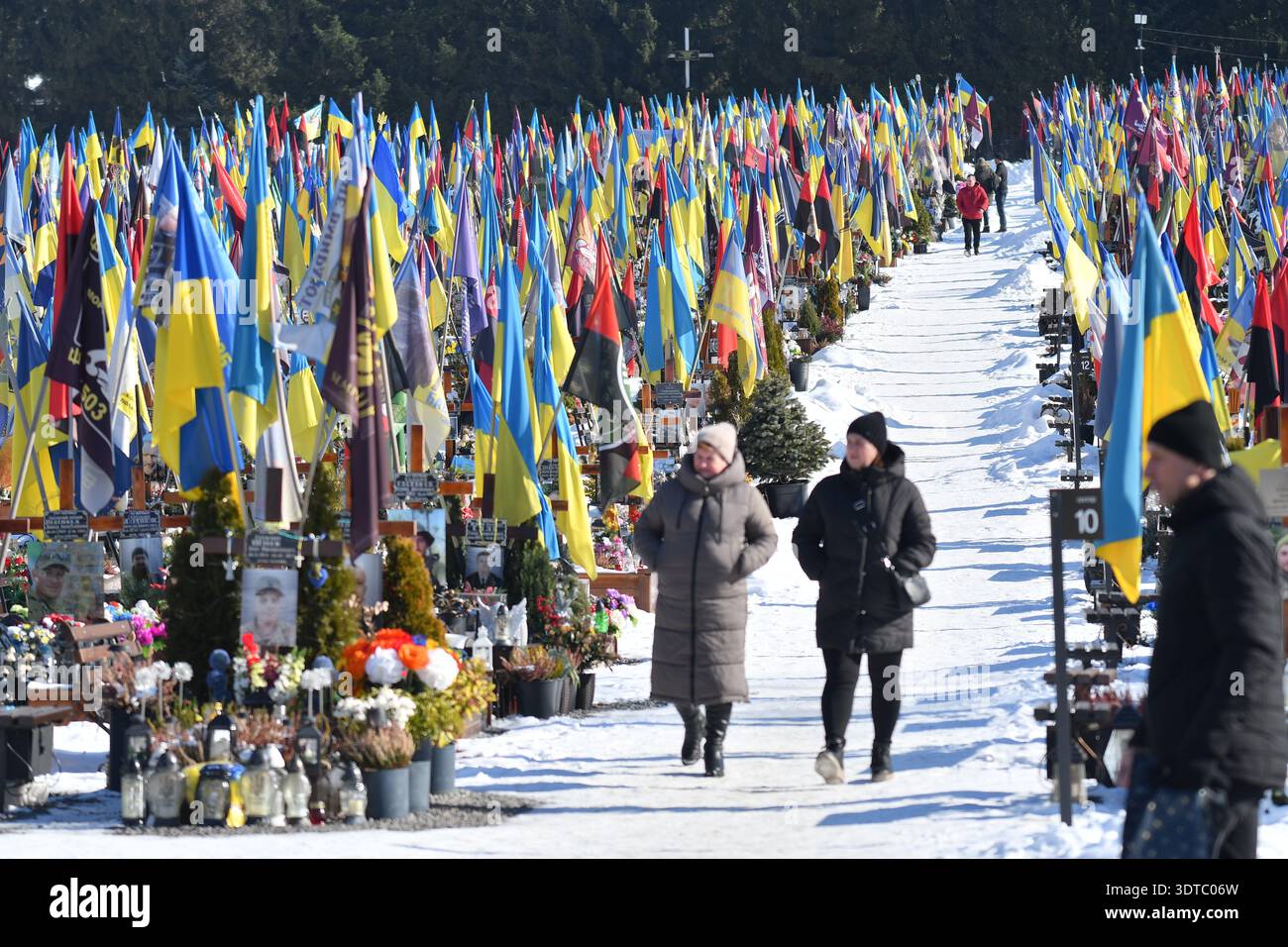 LVIV, UKRAINE - FEBRUARY 21, 2026: People and relatives visit the ...