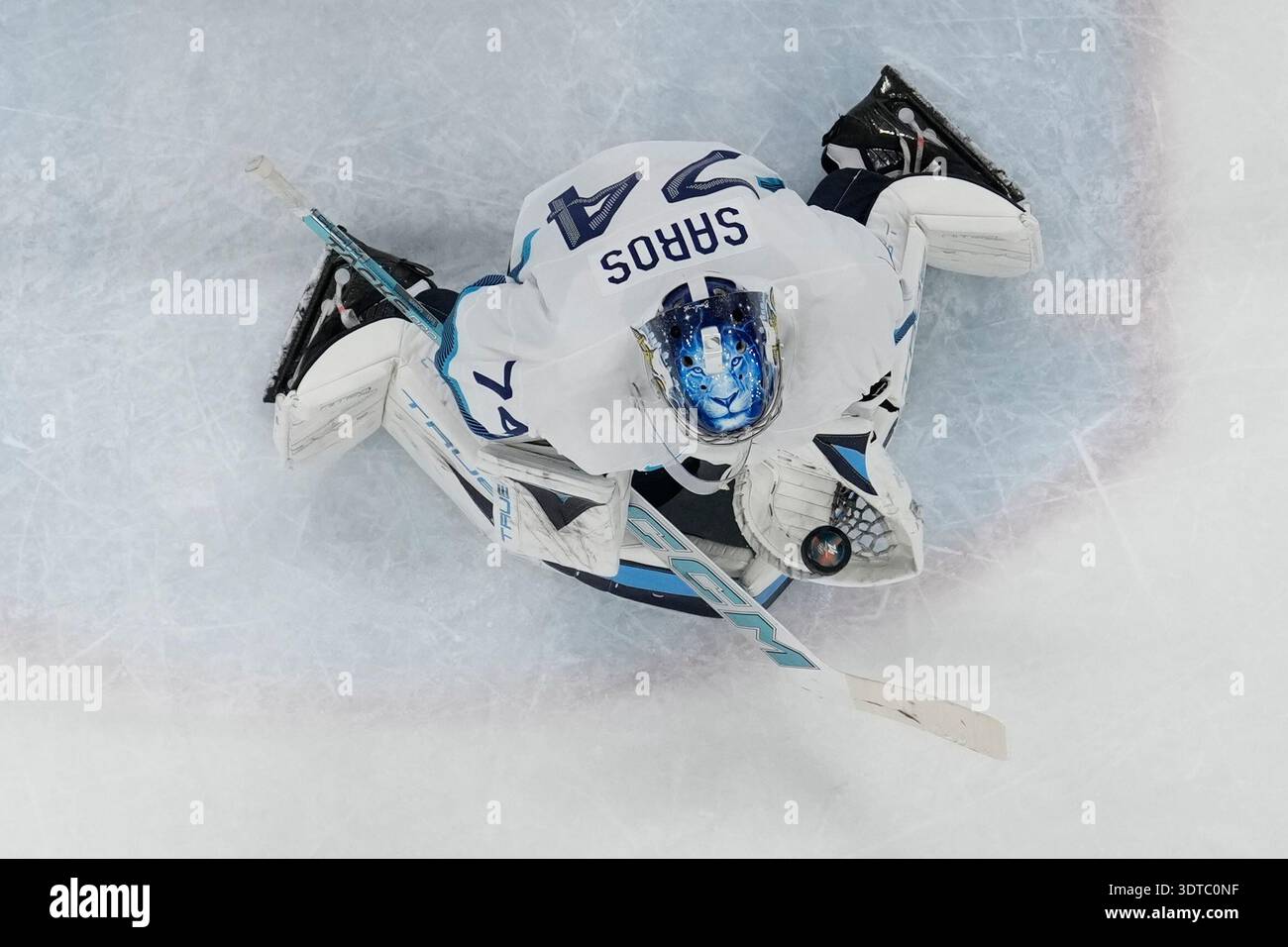 Finland's Juuse Saros (74) makes a save during a men's ice hockey ...