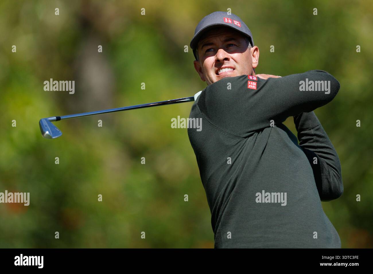 Adam Scott, from Australia, hits from the fourth tee during the third ...