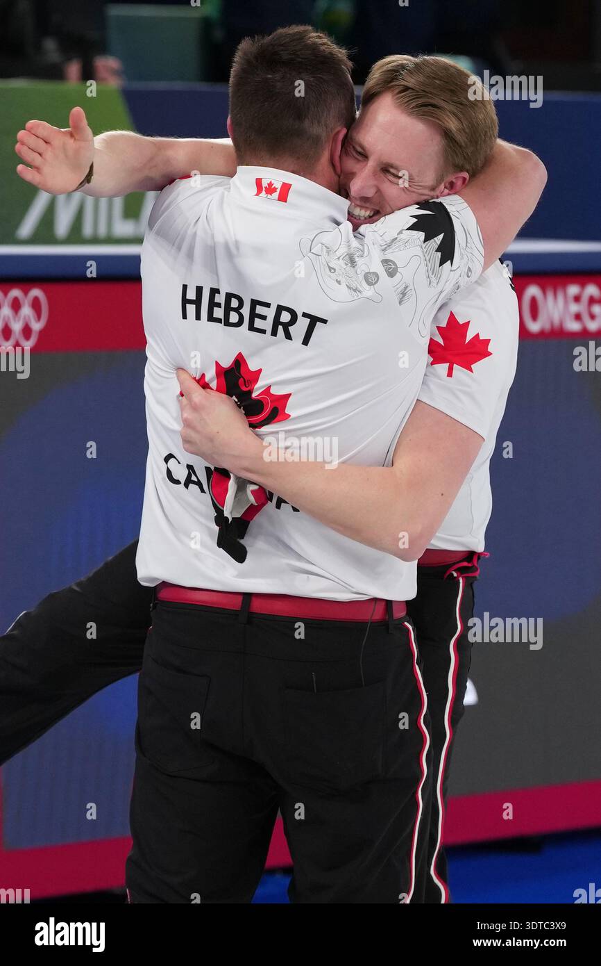 Canada's Ben Hebert, left, and Marc Kennedy celebrate defeating Britain ...