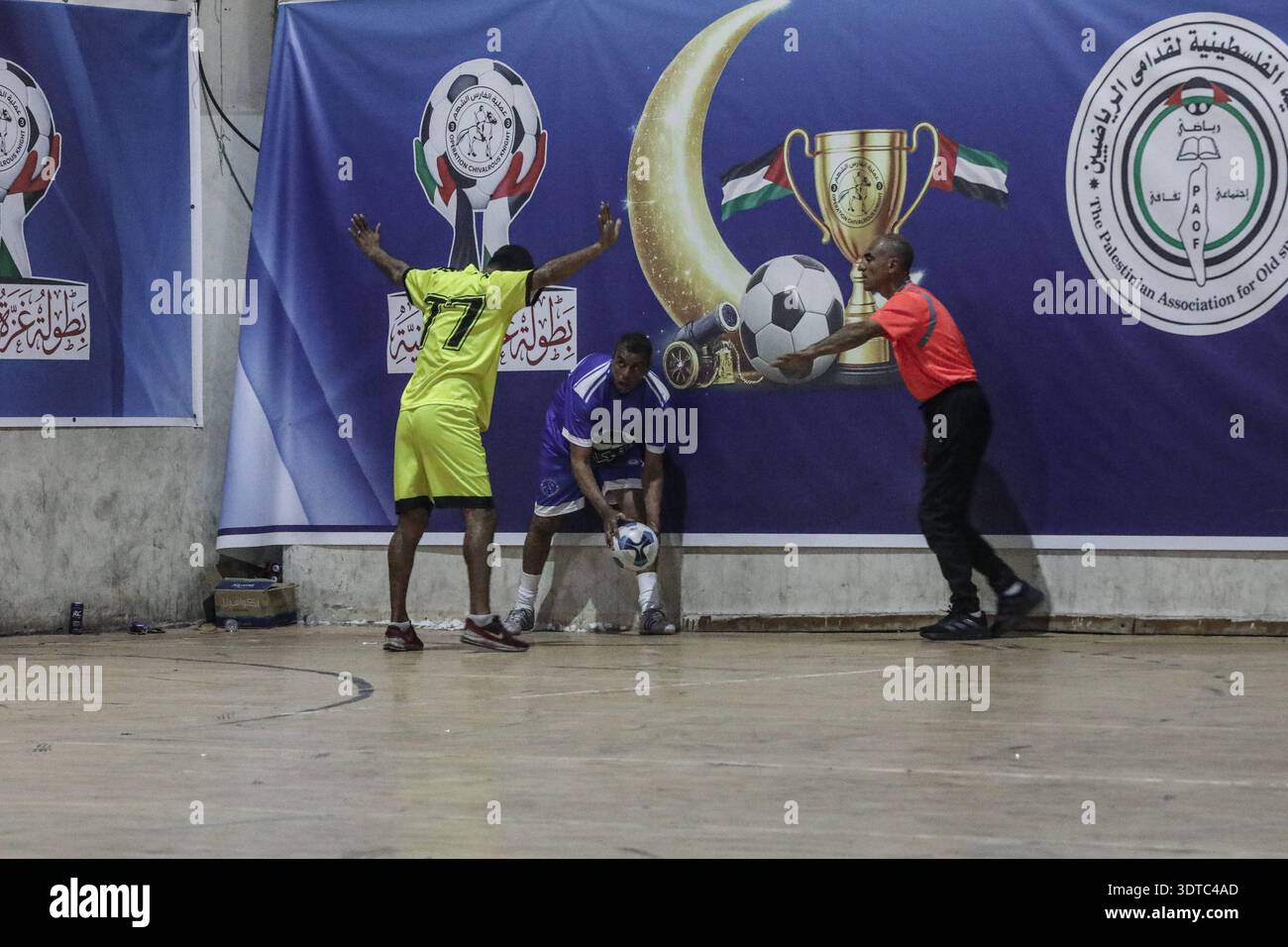 Palestinian players from the Al-Nuseirat and Rafah teams compete during ...