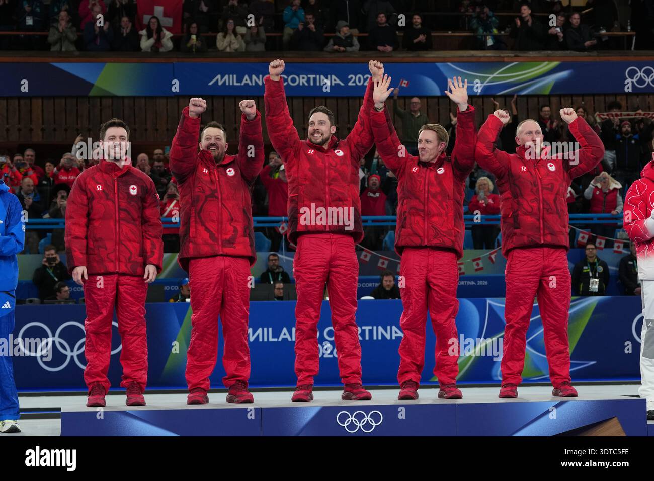 Team Canada poses after winning the gold medal of the men's curling, at ...