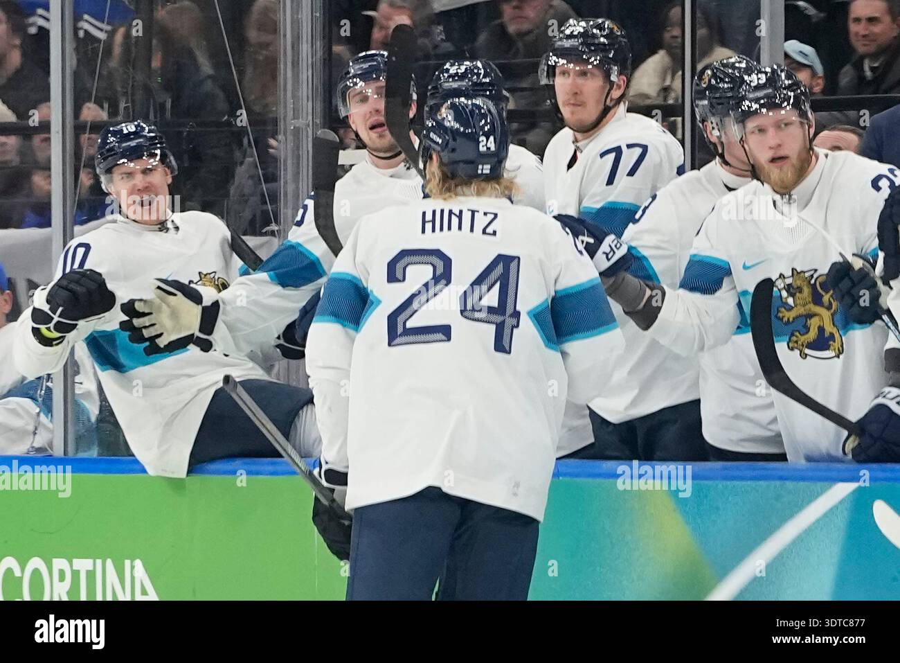 Finland's Roope Hintz (24) celebrates after scoring his side's third ...
