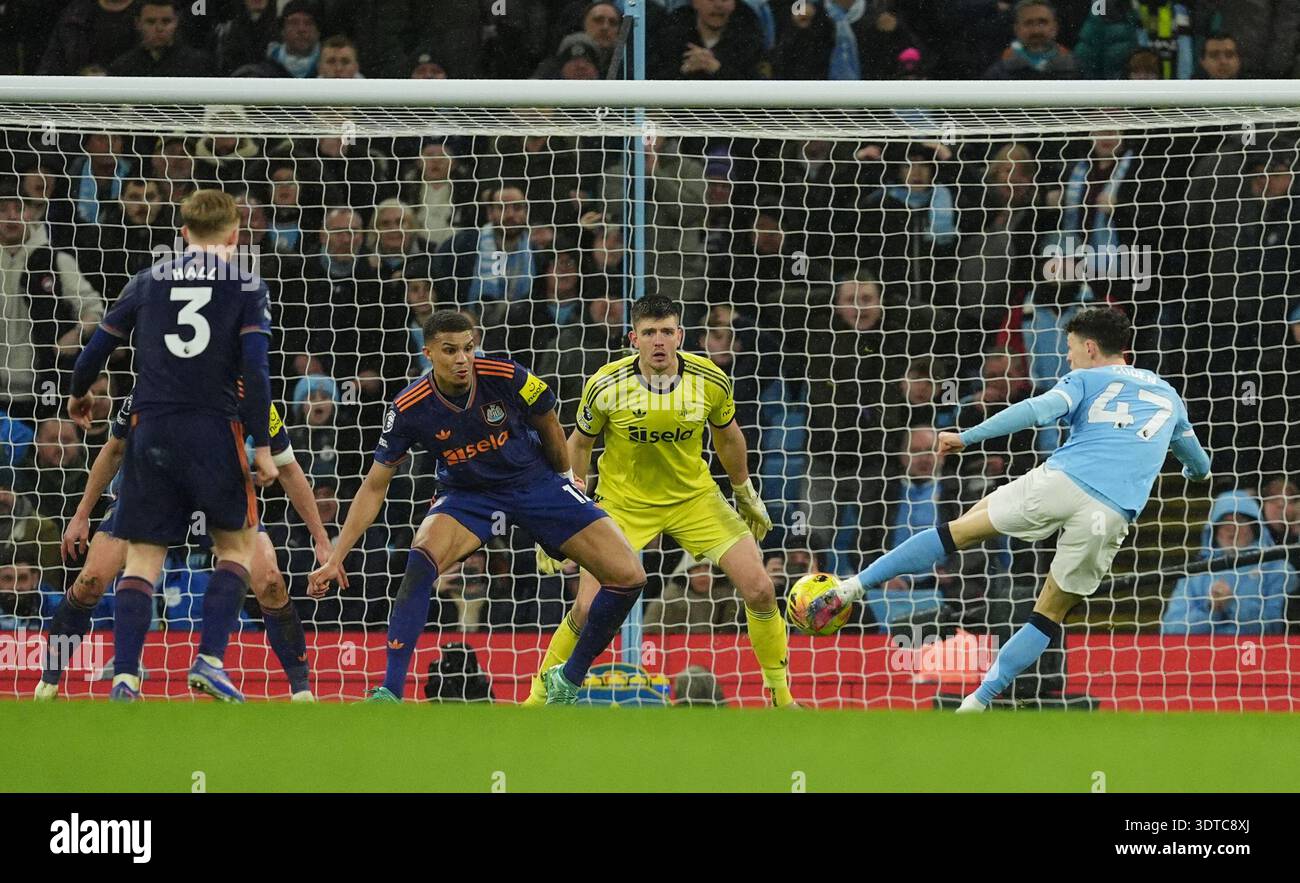 Manchester City's Phil Foden has a shot on goal during the Premier ...