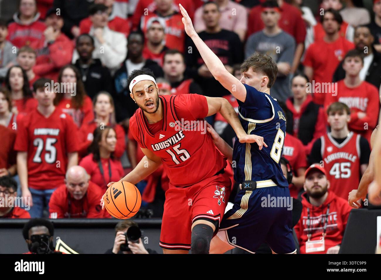 Louisville center Aly Khalifa (15) attempts to get around Georgia Tech ...