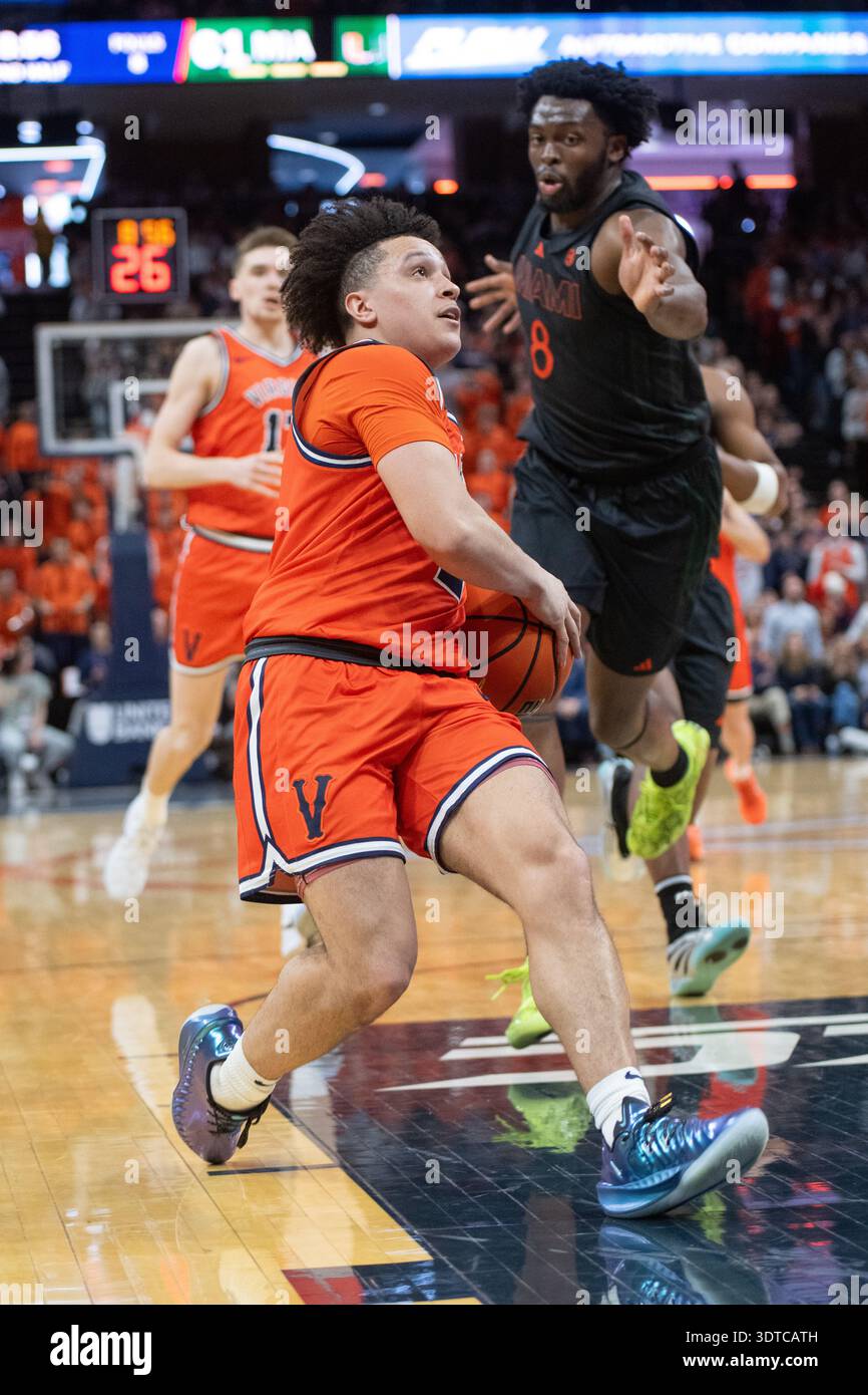 Virginia guard Chance Mallory, left, drives to basket against Miami ...