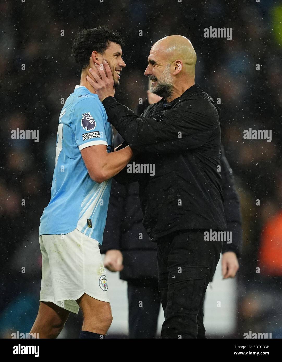 Manchester City's Matheus Nunes and Manchester City manager Pep ...