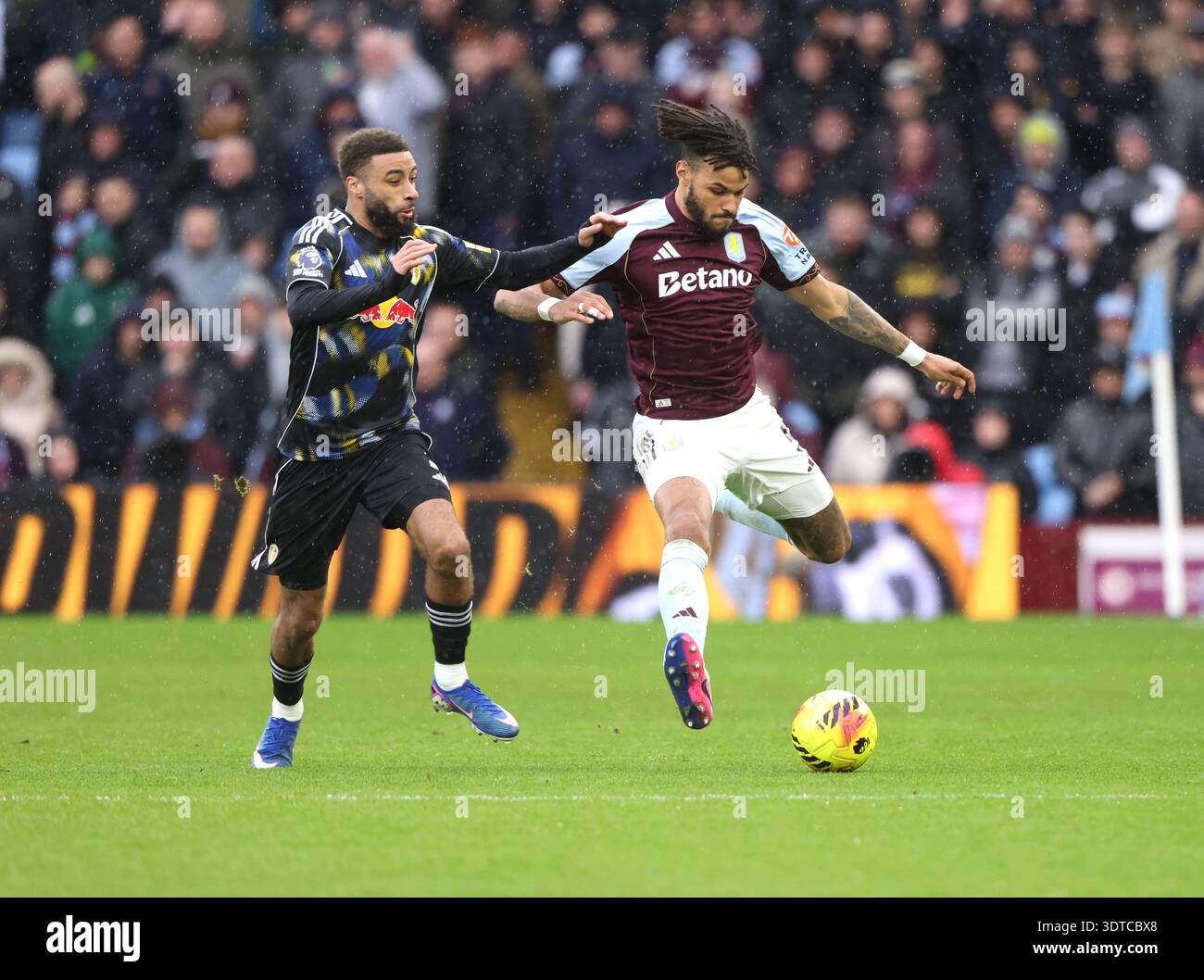 Nathan Patterson (E) Tyrone Mings (AV) at the Aston Villa v Leeds ...