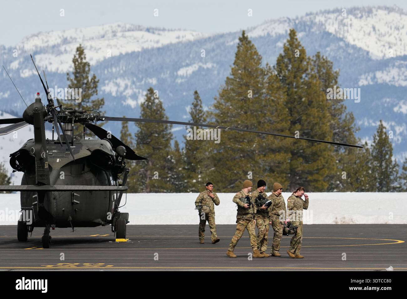 U.S. Army soldiers exit a Black Hawk at the Truckee Tahoe Airport in ...