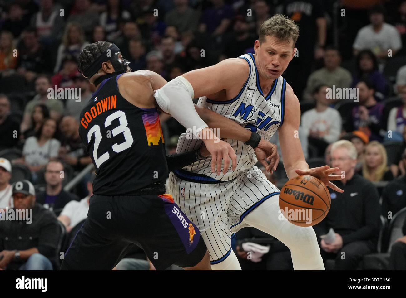 Orlando Magic forward Moritz Wagner drives on Phoenix Suns guard Jordan ...