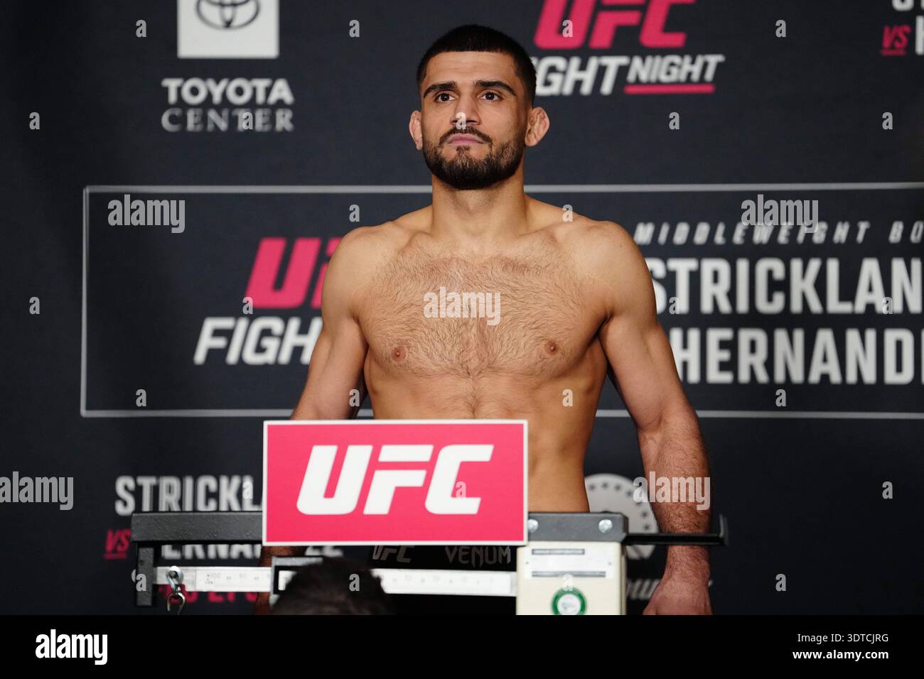 HOUSTON, TX February 20 : Ramiz Brahimaj steps on the scale for the ...