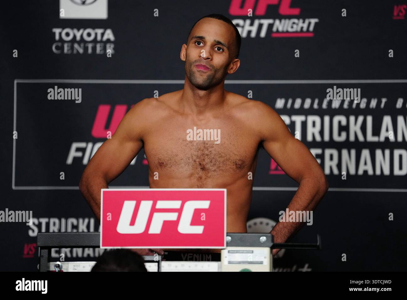 HOUSTON, TX February 20 : Jordan Leavitt steps on the scale for the ...