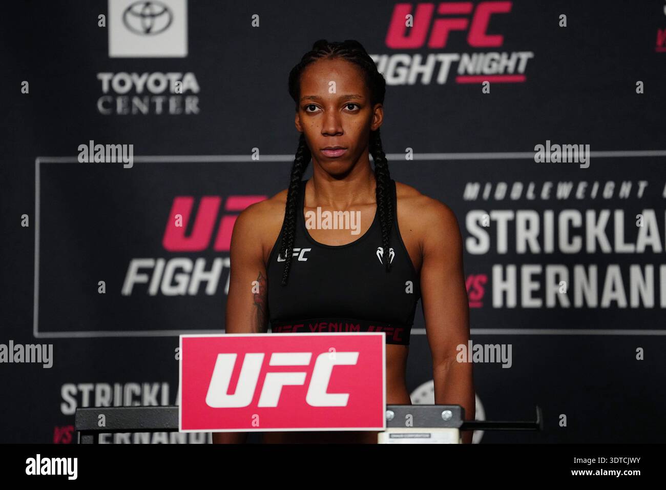HOUSTON, TX February 20 : Joselyne Edwards steps on the scale for the ...