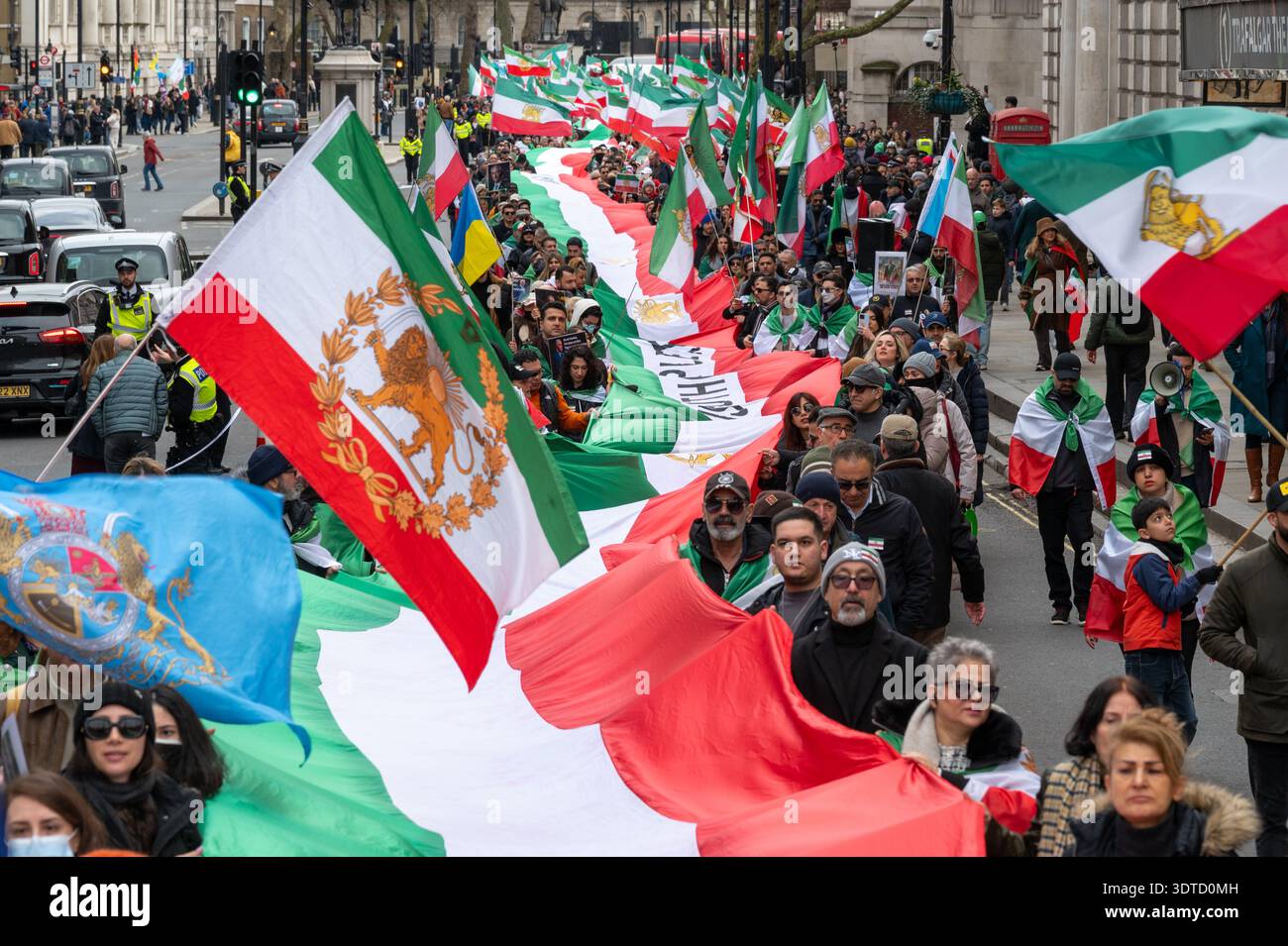 Hundreds of Iranians march in Whitehall. Members of the Iranian ...