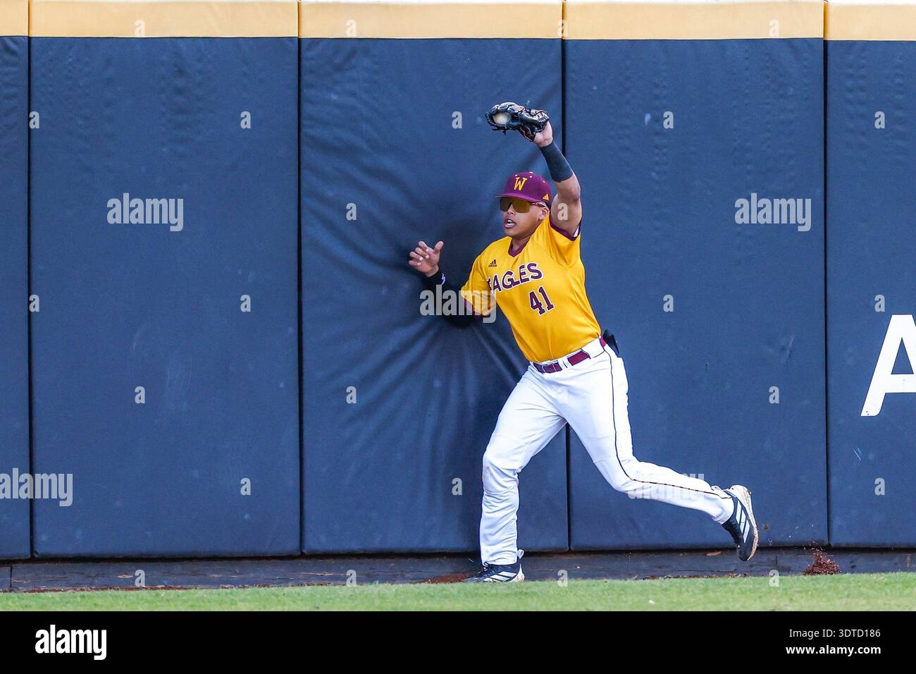 Winthrop outfielder Jaylen Hernandez catches the bal for an out during ...