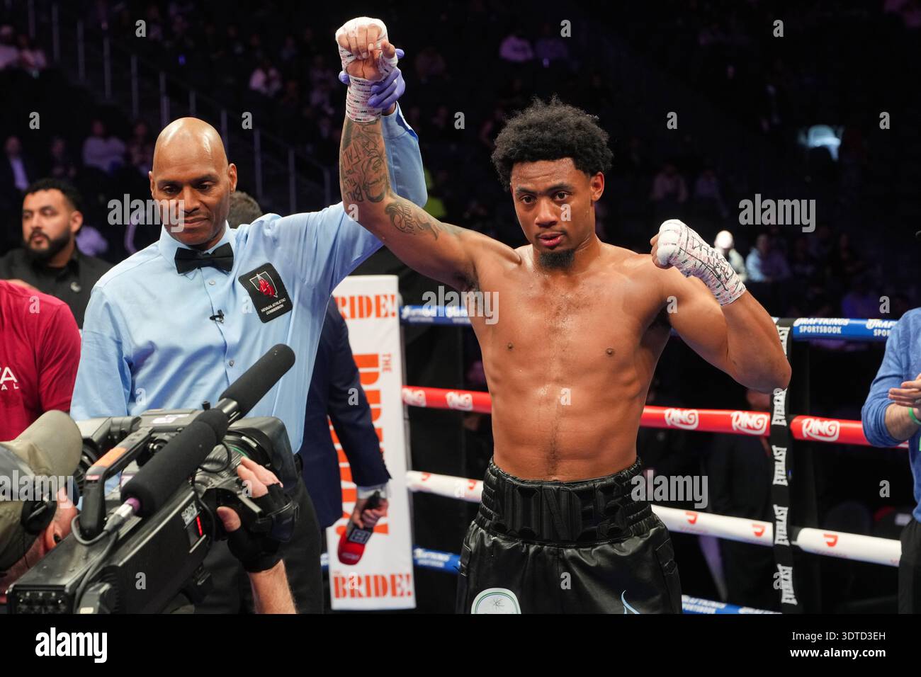 Amari Jones celebrates after winning a middleweight boxing match ...