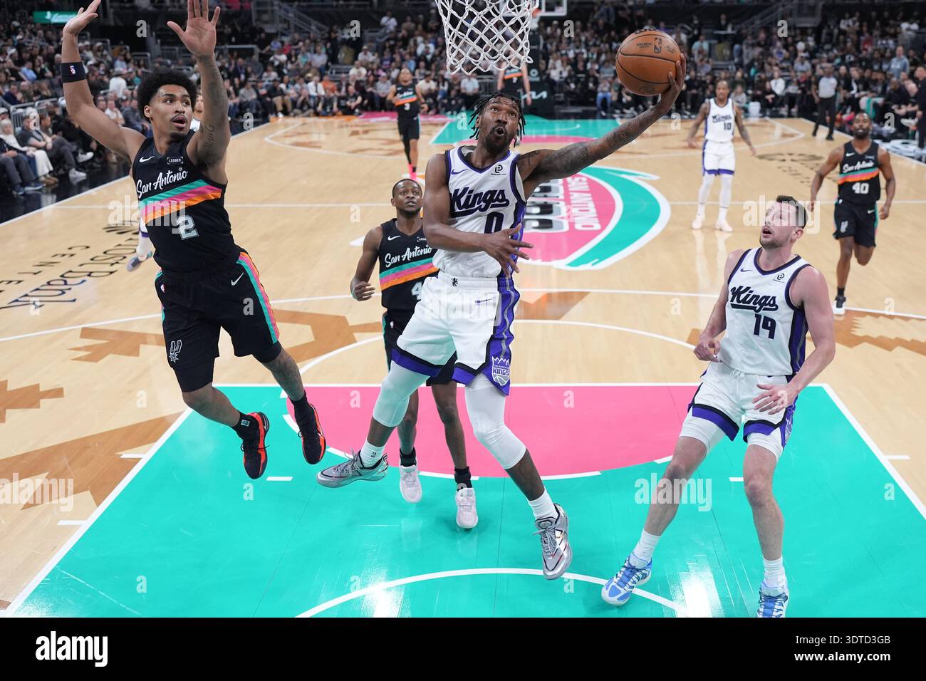 Sacramento Kings guard Malik Monk (0) drives to the basket past San ...