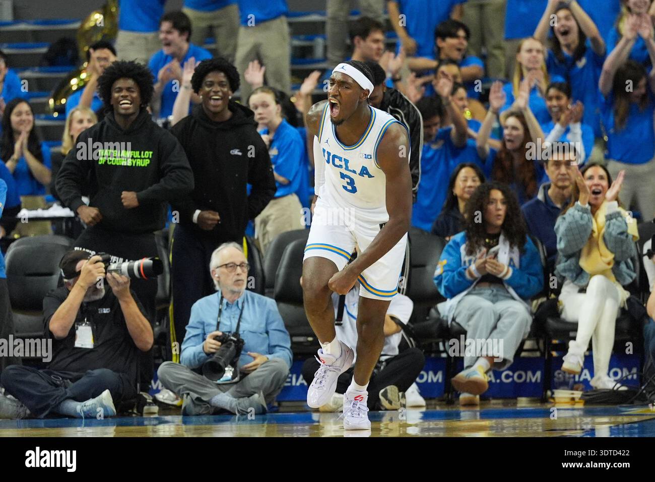 UCLA guard Eric Dailey Jr. (3) celebrates his basket during the first ...