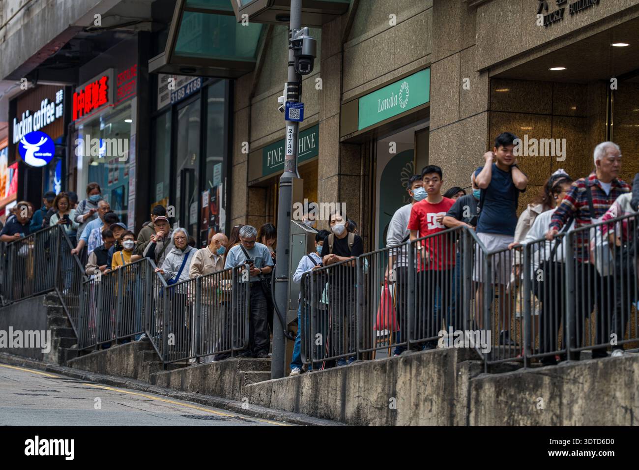People lining up to buy mark six lottery tickets at the Hong Kong ...