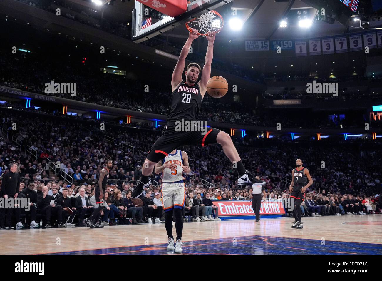 Houston Rockets center Alperen Sengun (28) dunks during the first half ...