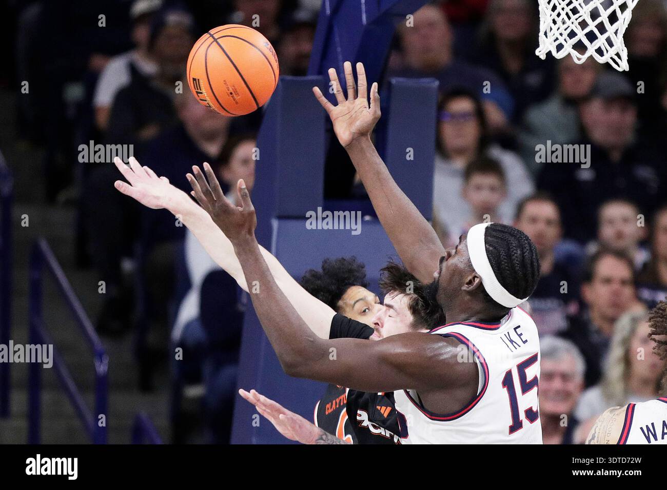 Gonzaga forward Graham Ike (15) and Pacific center Isaac Jack, left, go ...