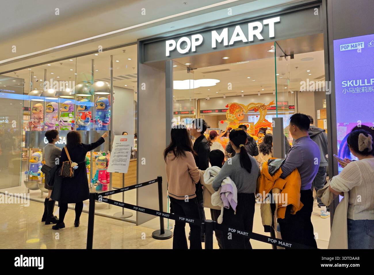 TIANJIN, CHINA - FEBRUARY 21, 2026 - A customer is shopping at a Pop ...