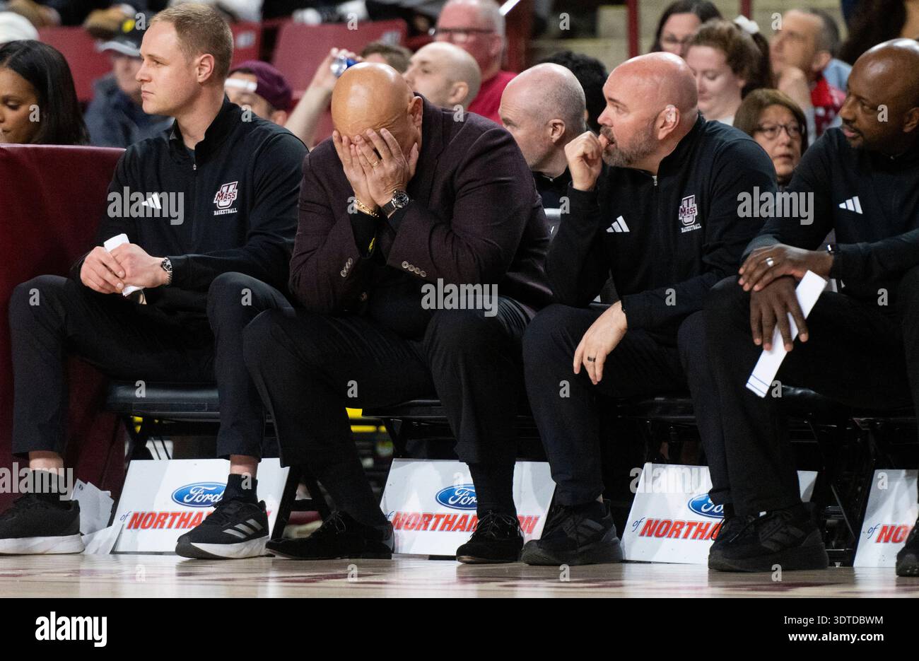 Massachusetts head coach Frank Martin, second from left, reacts during ...