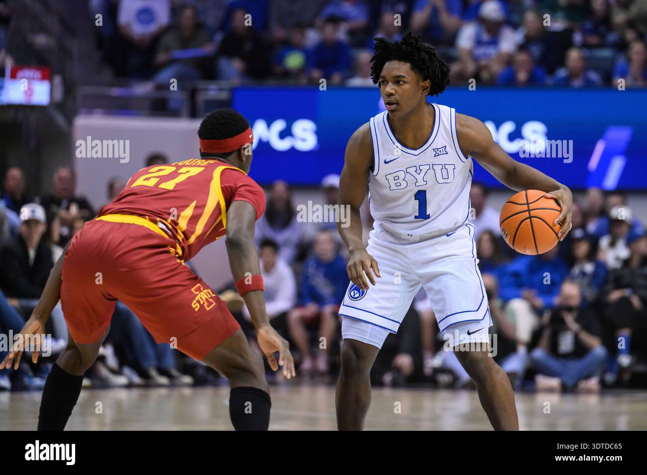 BYU guard Robert Wright III (1) sets a play while defended by Iowa ...
