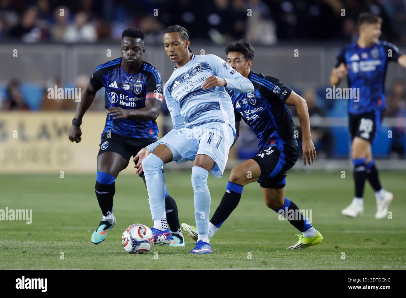 Sporting Kansas City midfielder Calvin Harris (11) passes the ball ...