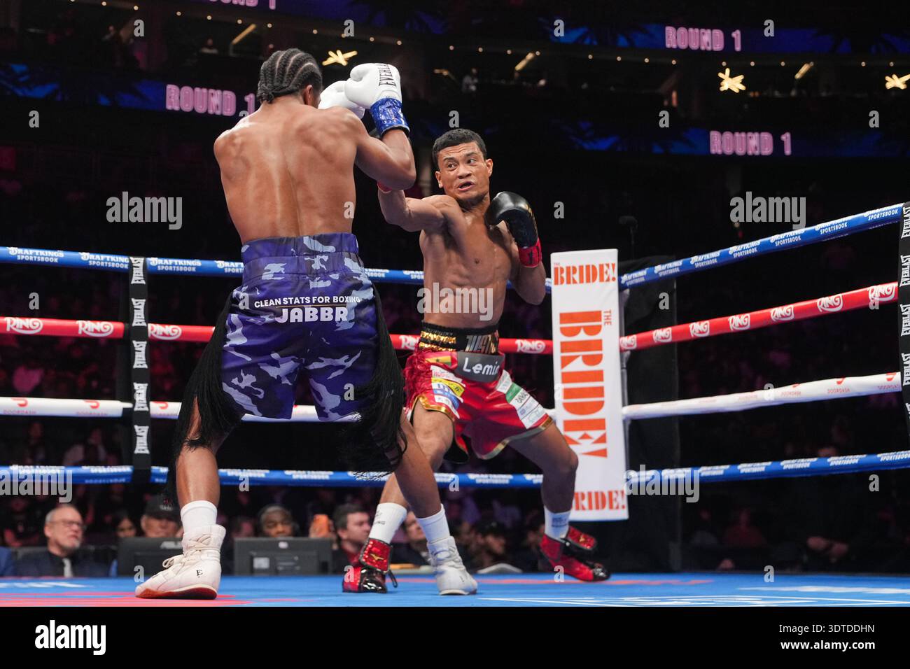 Andy Hiraoka, right, fights Gary Antuanne Russell in a WBA super ...