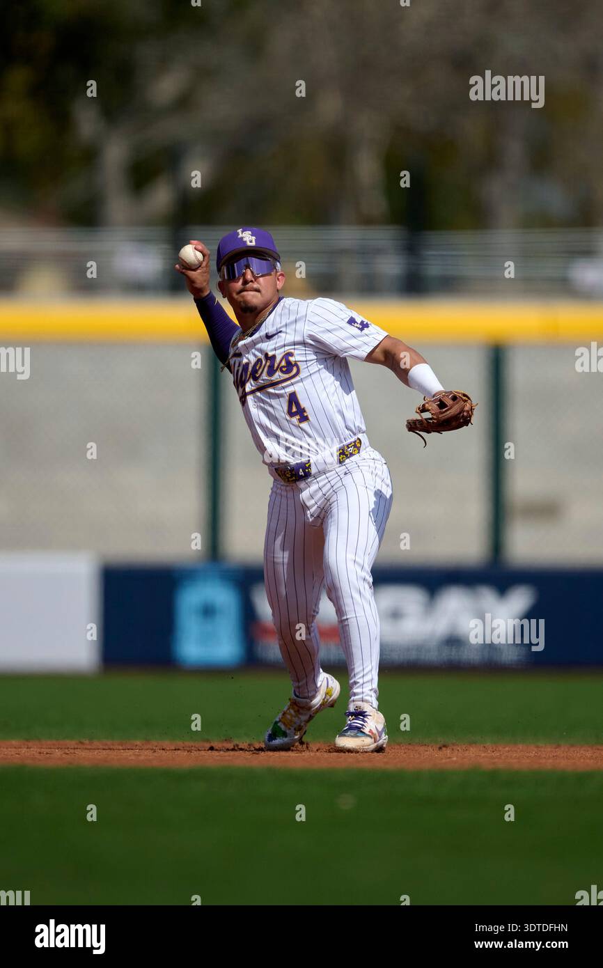LSU Tigers shortstop Steven Milam (4) throws to first base during an ...