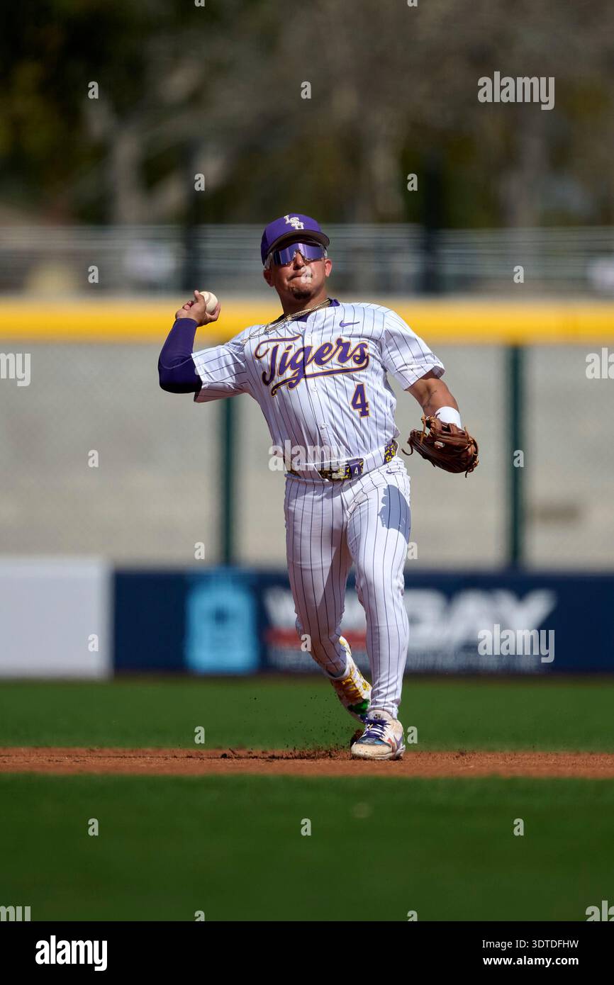 LSU Tigers shortstop Steven Milam (4) throws to first base during an ...