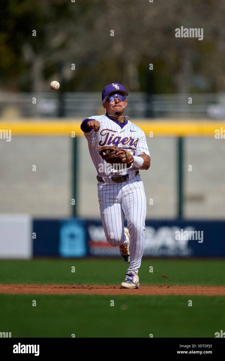 LSU Tigers shortstop Steven Milam (4) throws to first base during an ...