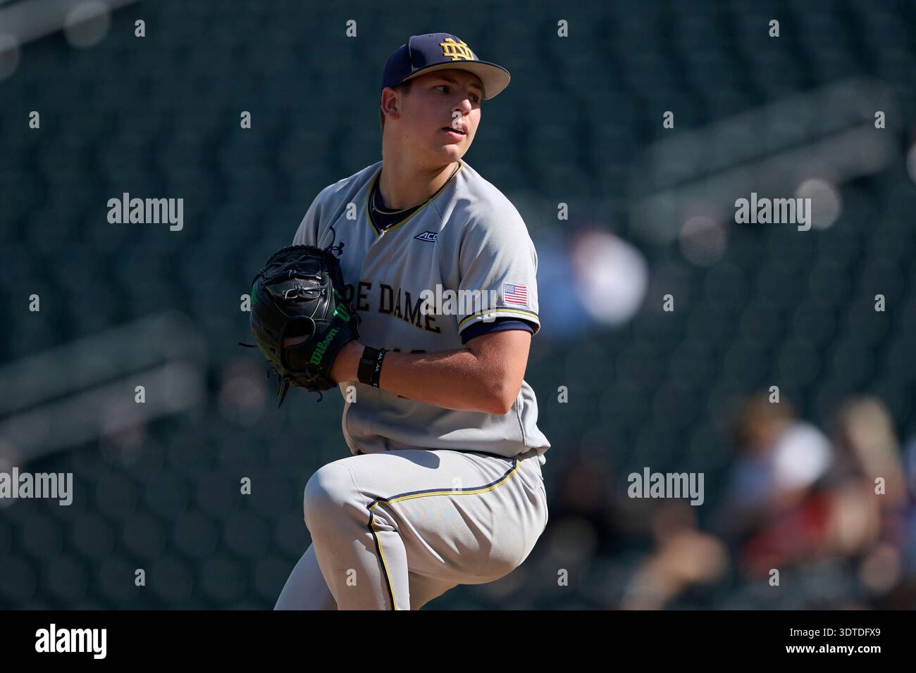 Notre Dame Fighting Irish pitcher Aiden Zerr (18) delivers a pitch ...