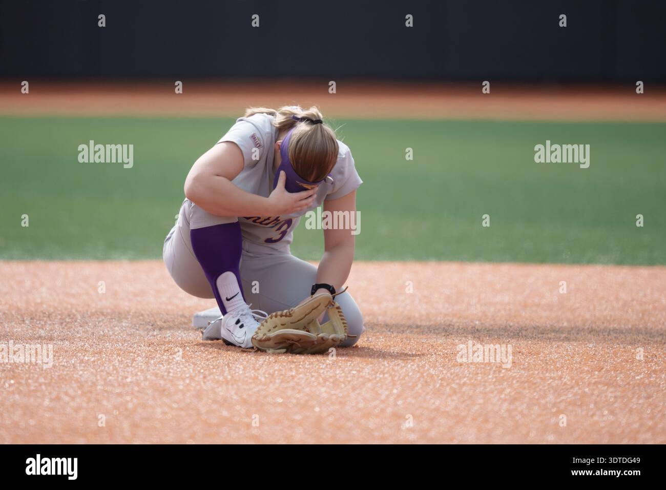 Northern Iowa players including infielder Skylar Benesh (3) pray for ...