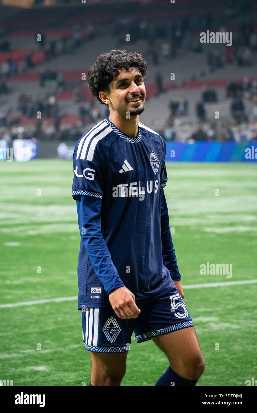 Jeevan Badwal (59 Vancouver Whitecaps FC) smiles after winning the ...