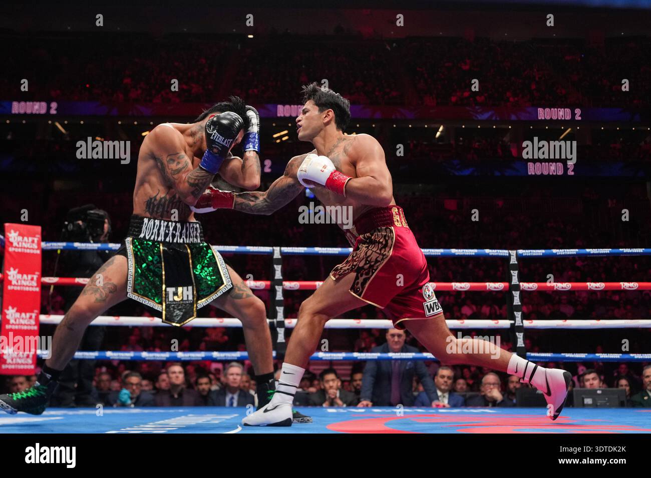 Ryan Garcia, right, fights Mario Barrios in a WBC welterweight title ...