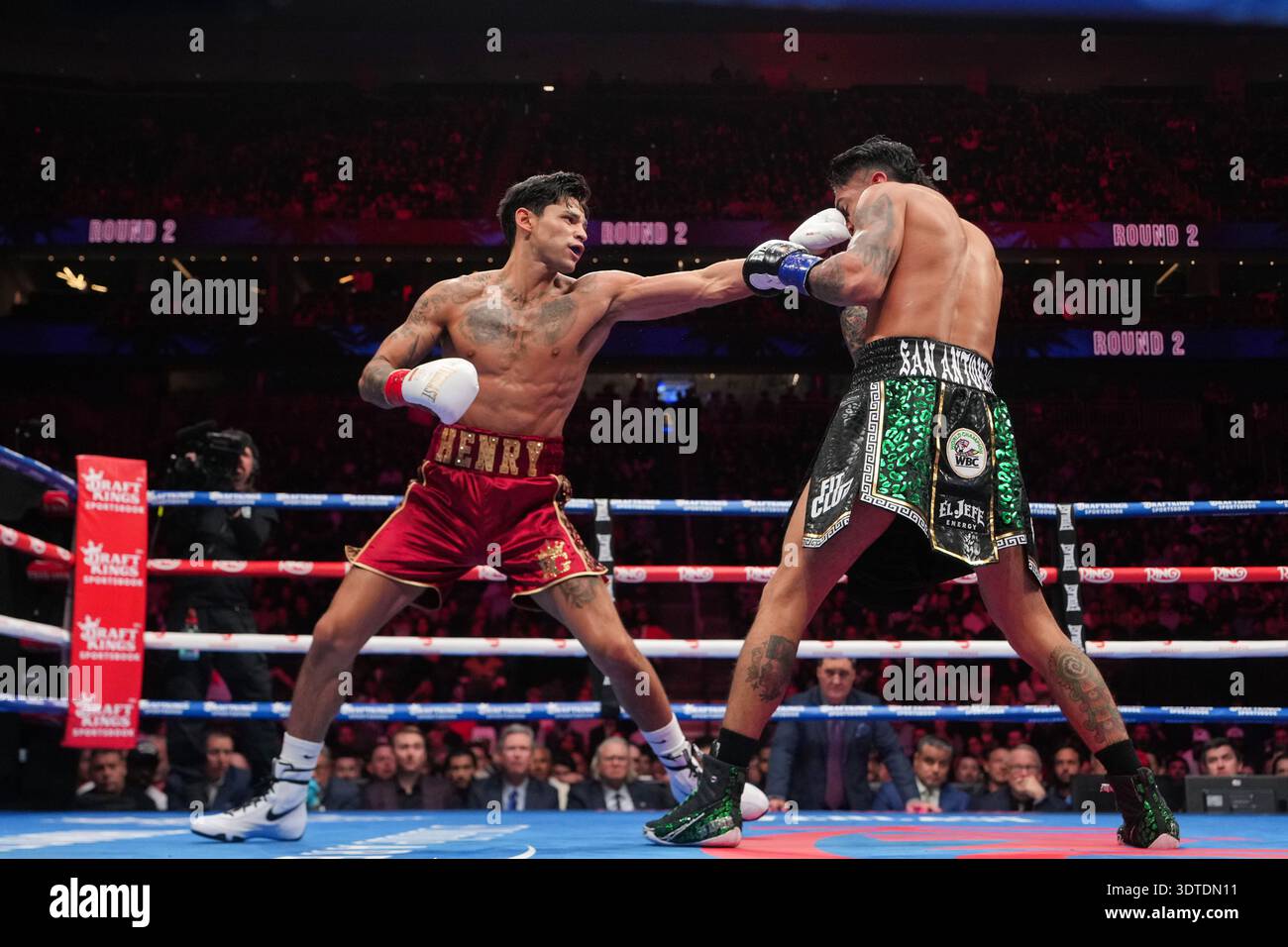 Ryan Garcia, left, fights Mario Barrios in a WBC welterweight title ...