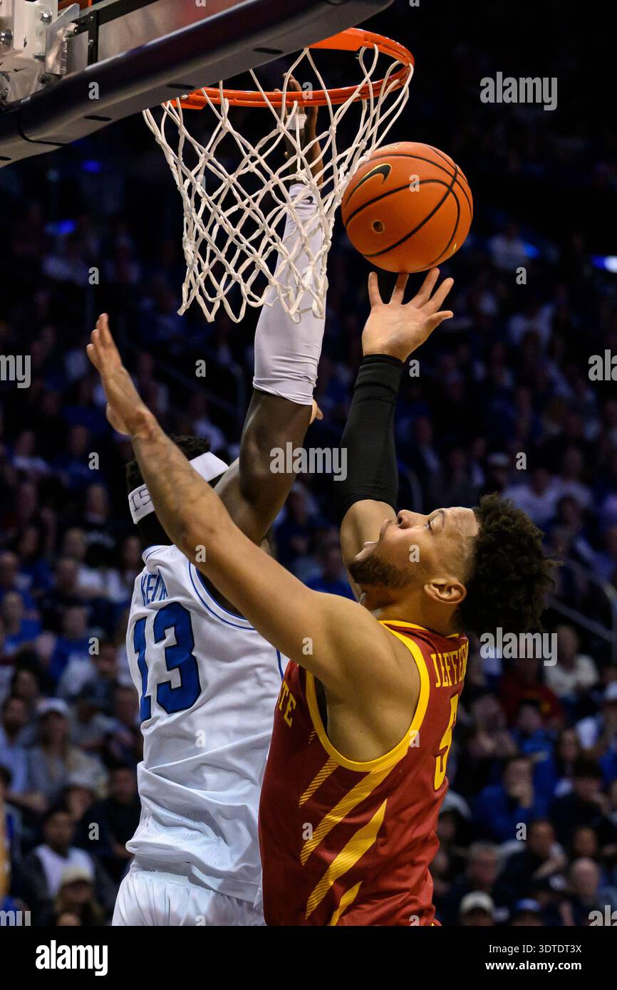 BYU center Keba Keita, left, blocks the shot of Iowa State forward ...