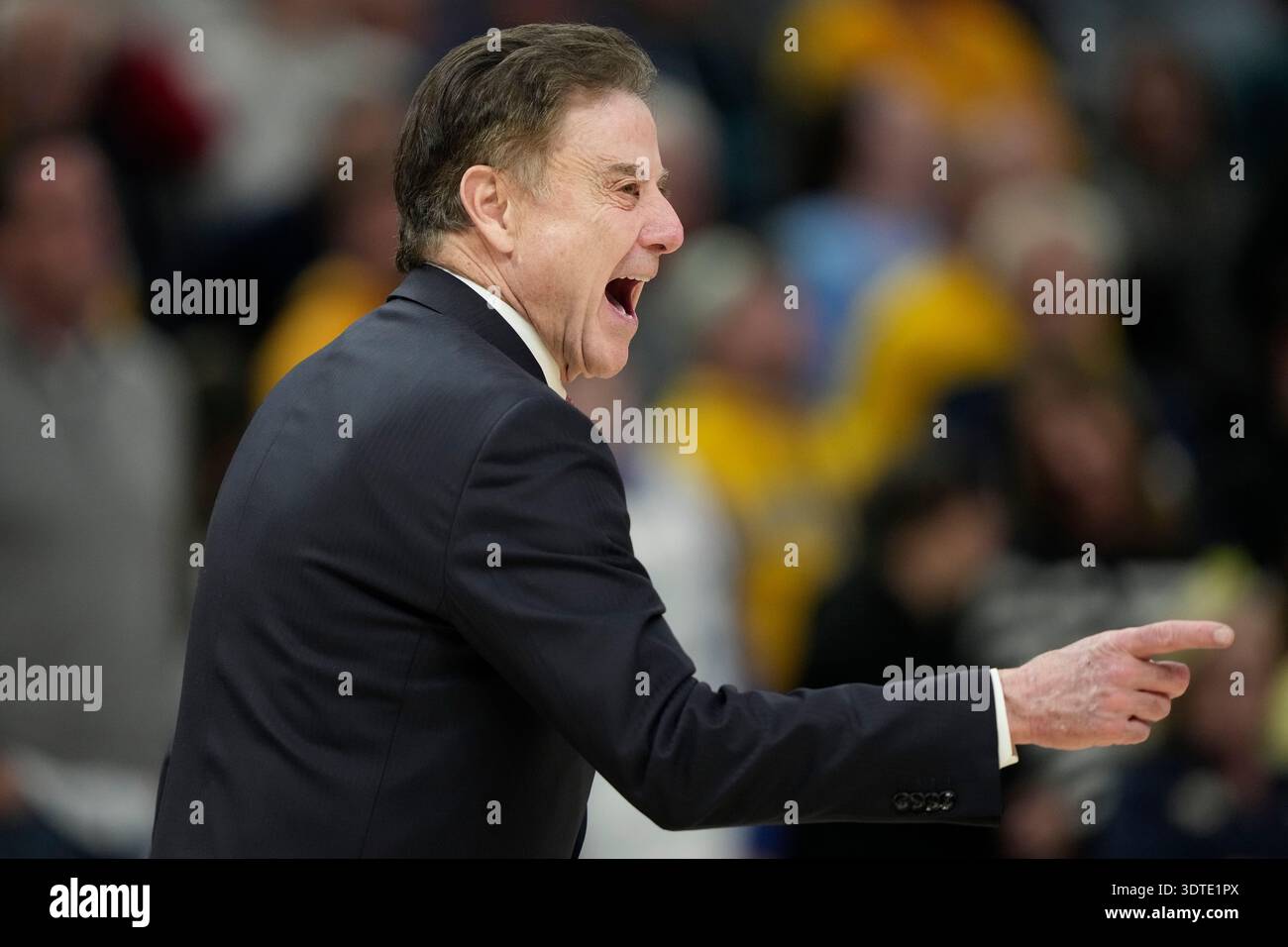 St. John's head coach Rick Pitino yells during an NCAA college ...