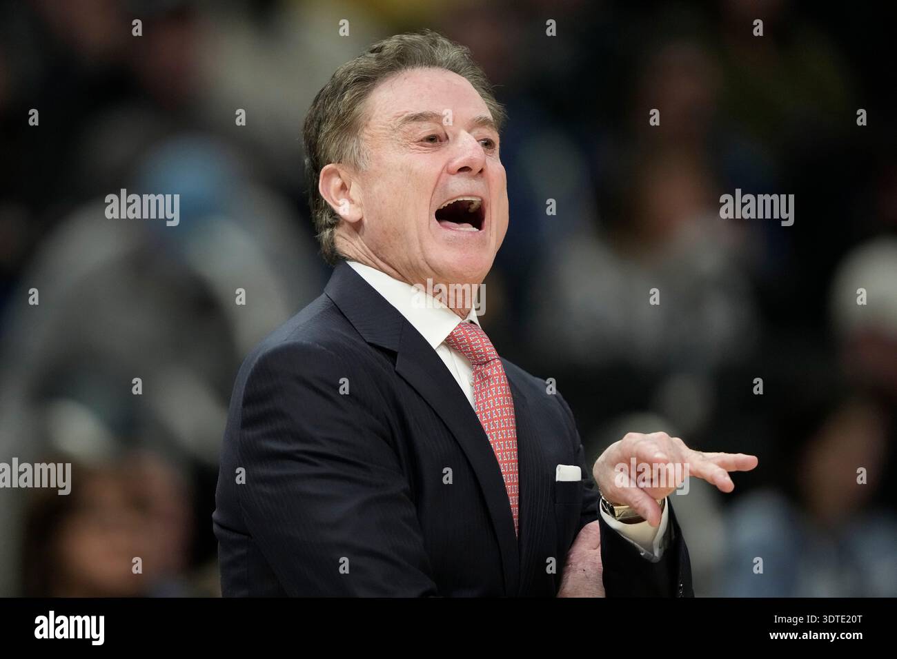 St. John's head coach Rick Pitino yells during an NCAA college ...