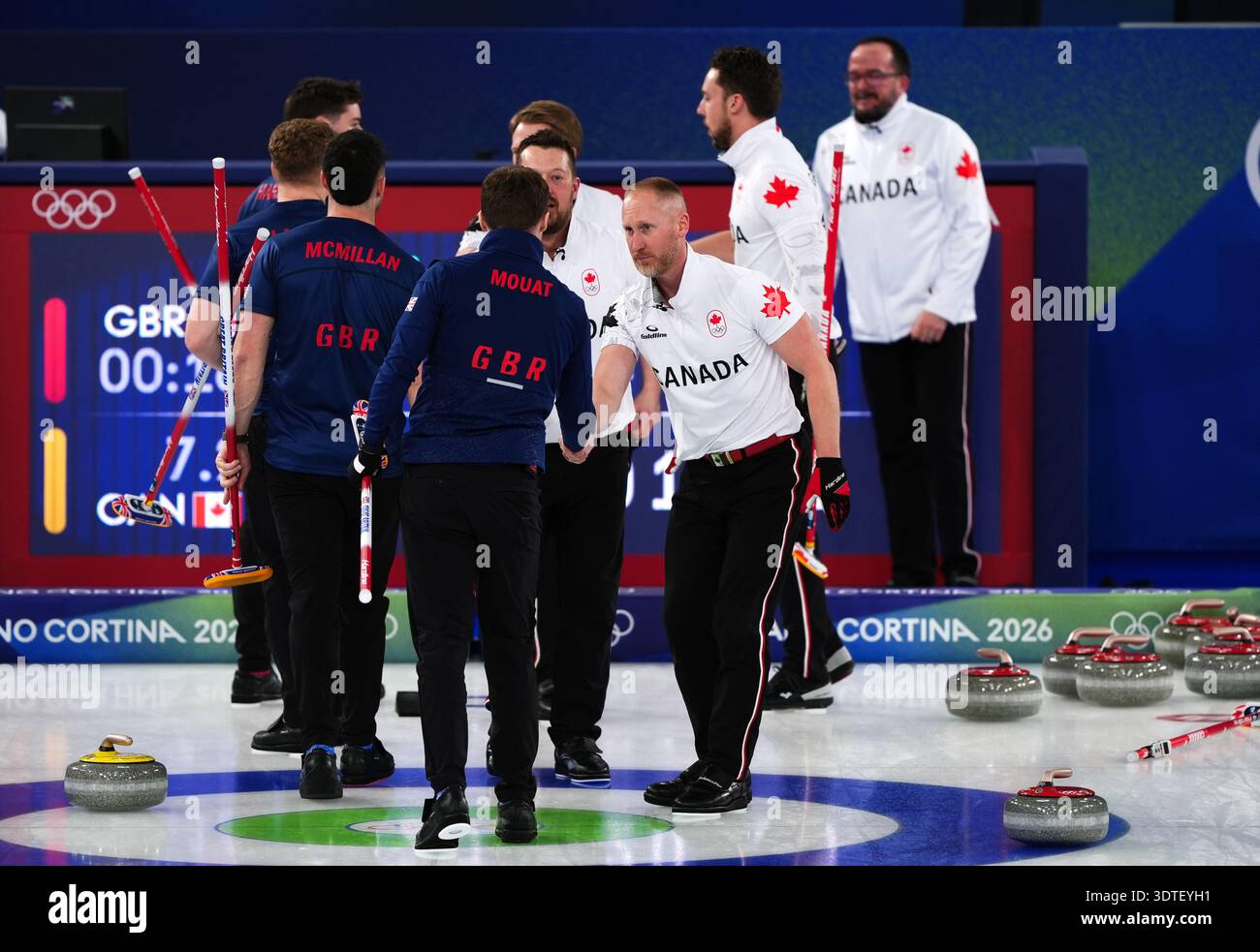 Great Britain's Bruce Mouat with Canada's Brad Jacobs following the Men ...
