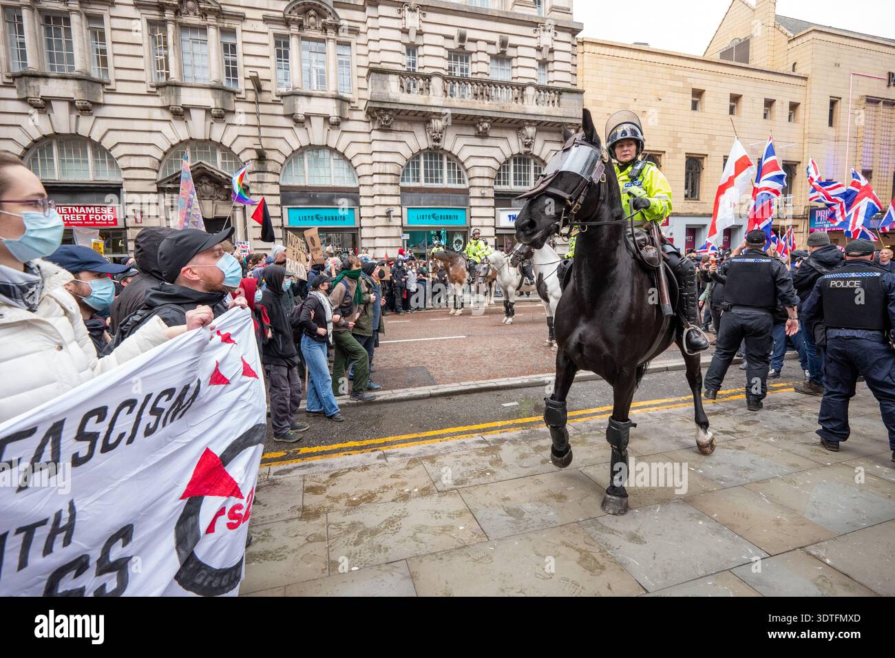 Anti fascist supporters are separated from Britain First by police ...
