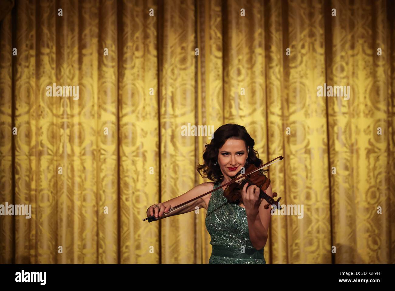 Moldovan violinist Rusanda Panfili performs during the Governors Dinner ...