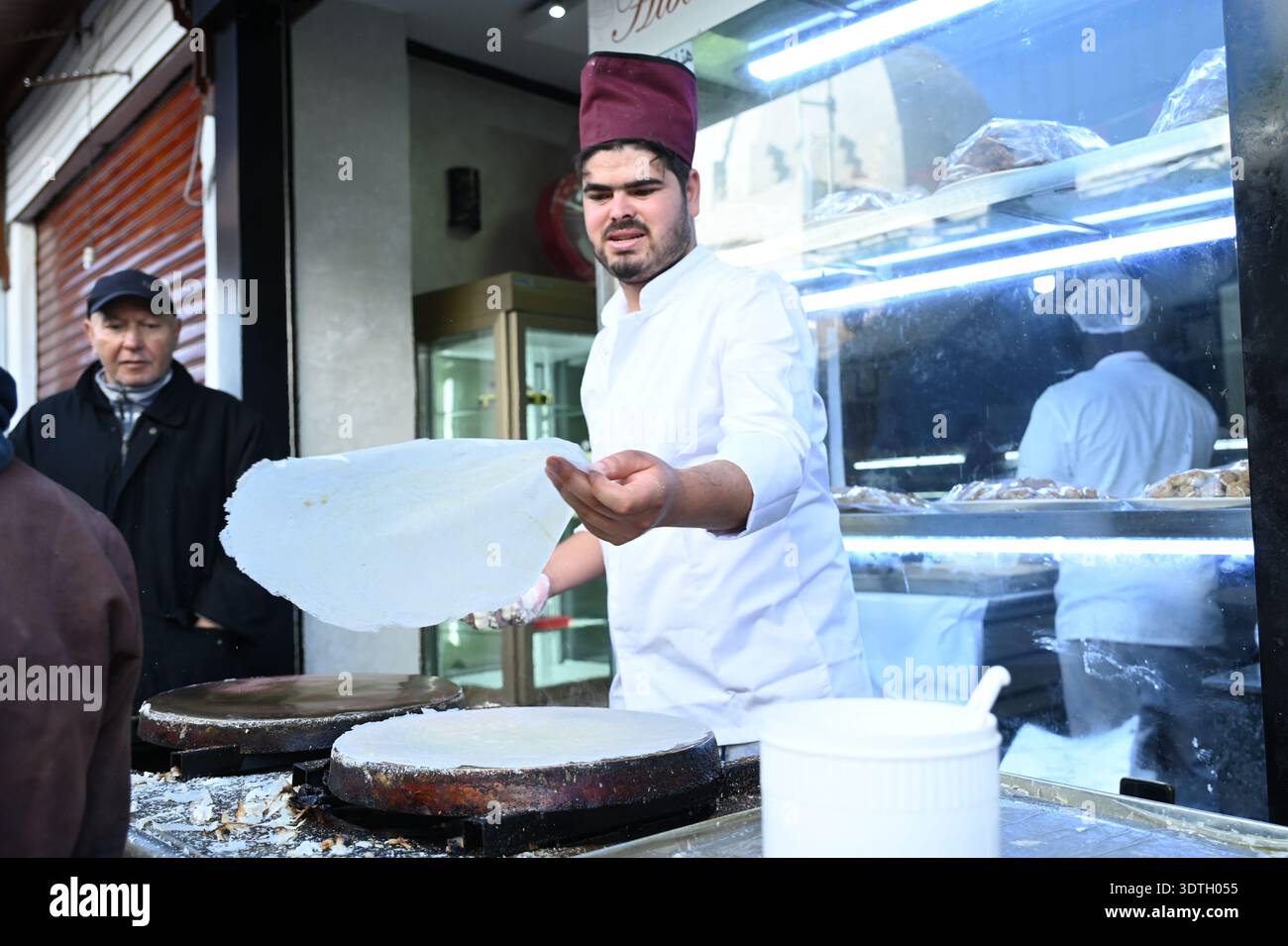 (260222) -- RABAT, Feb. 22, 2026 (Xinhua) -- A vendor makes traditional ...