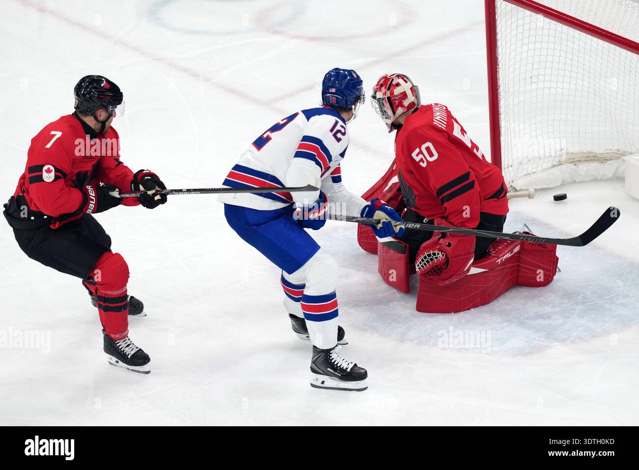 United States' Matt Boldy (12) scores against Canada goalkeeper Jordan ...