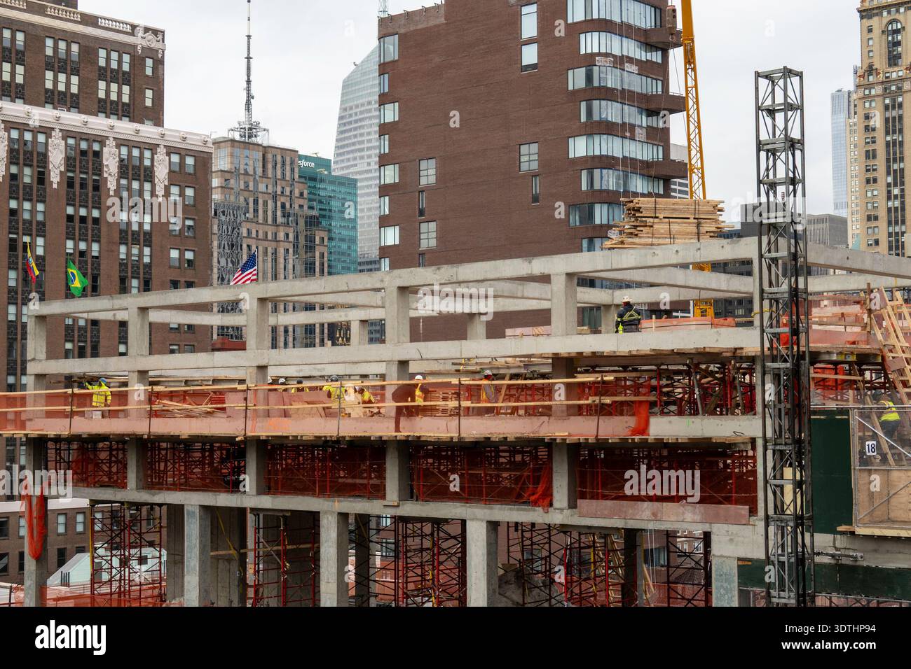 A residential high-rise building is under construction at East 35th ...
